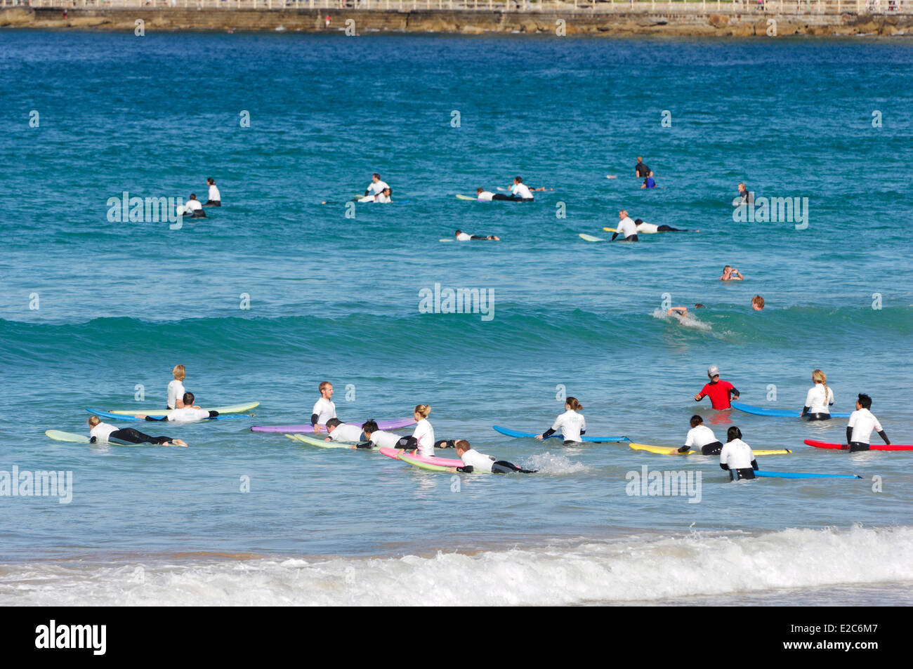 Surfers sitting on boards hi-res stock photography and images - Alamy