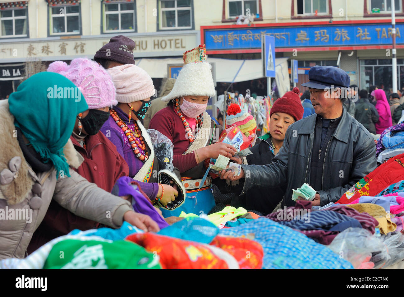 China, Gansu Province, Amdo, Xiahe, Losar, Fabrics market Stock Photo ...