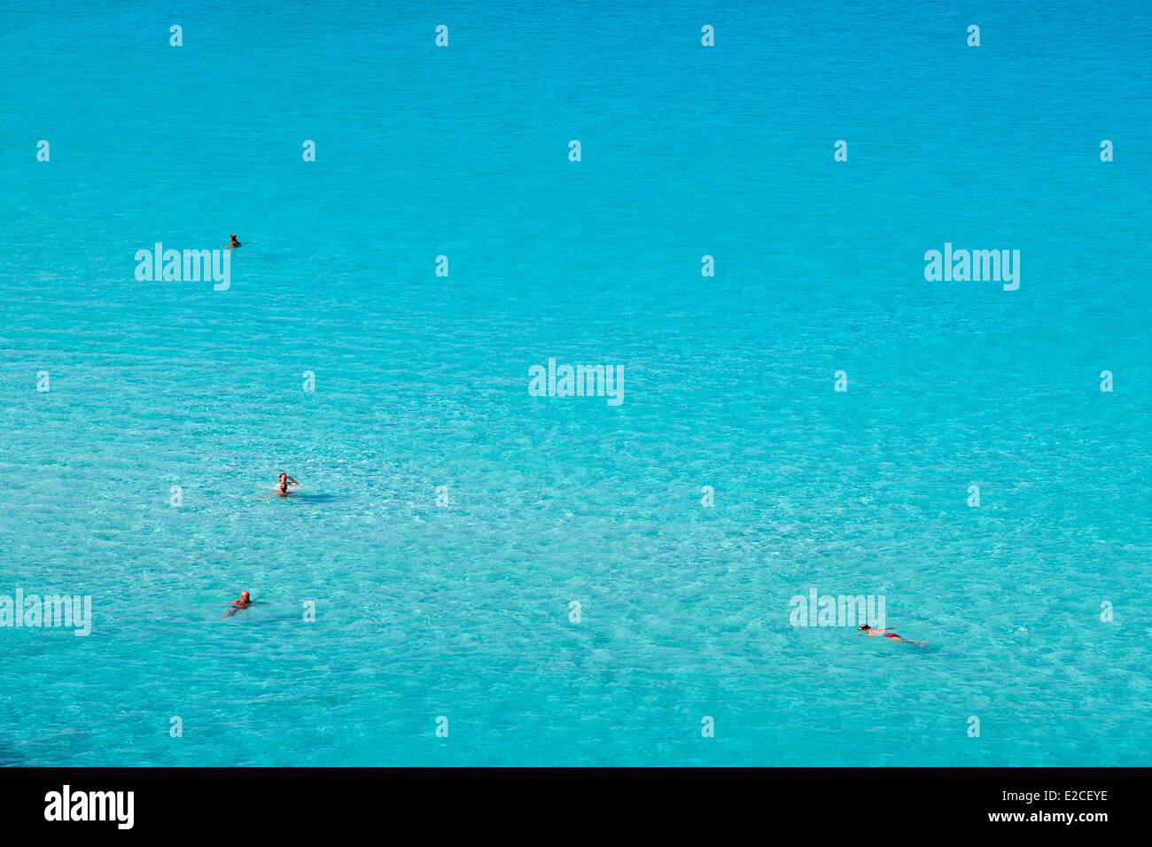 Italy, Sicily, Egadi islands, island of Favignana, Cala Rossa, swimmers ...