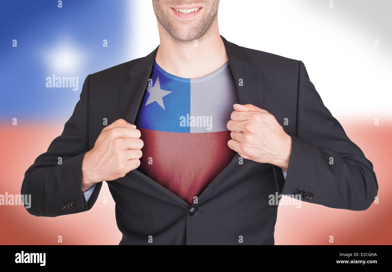 Businessman opening suit to reveal shirt with flag, Chile Stock Photo ...
