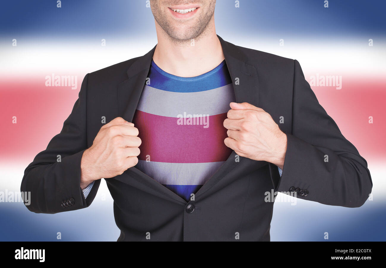 Businessman opening suit to reveal shirt with flag, Costa Rica Stock ...