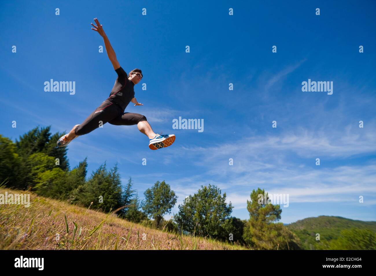 France, Lozere, Cevennes, man running in the mountains Stock Photo - Alamy