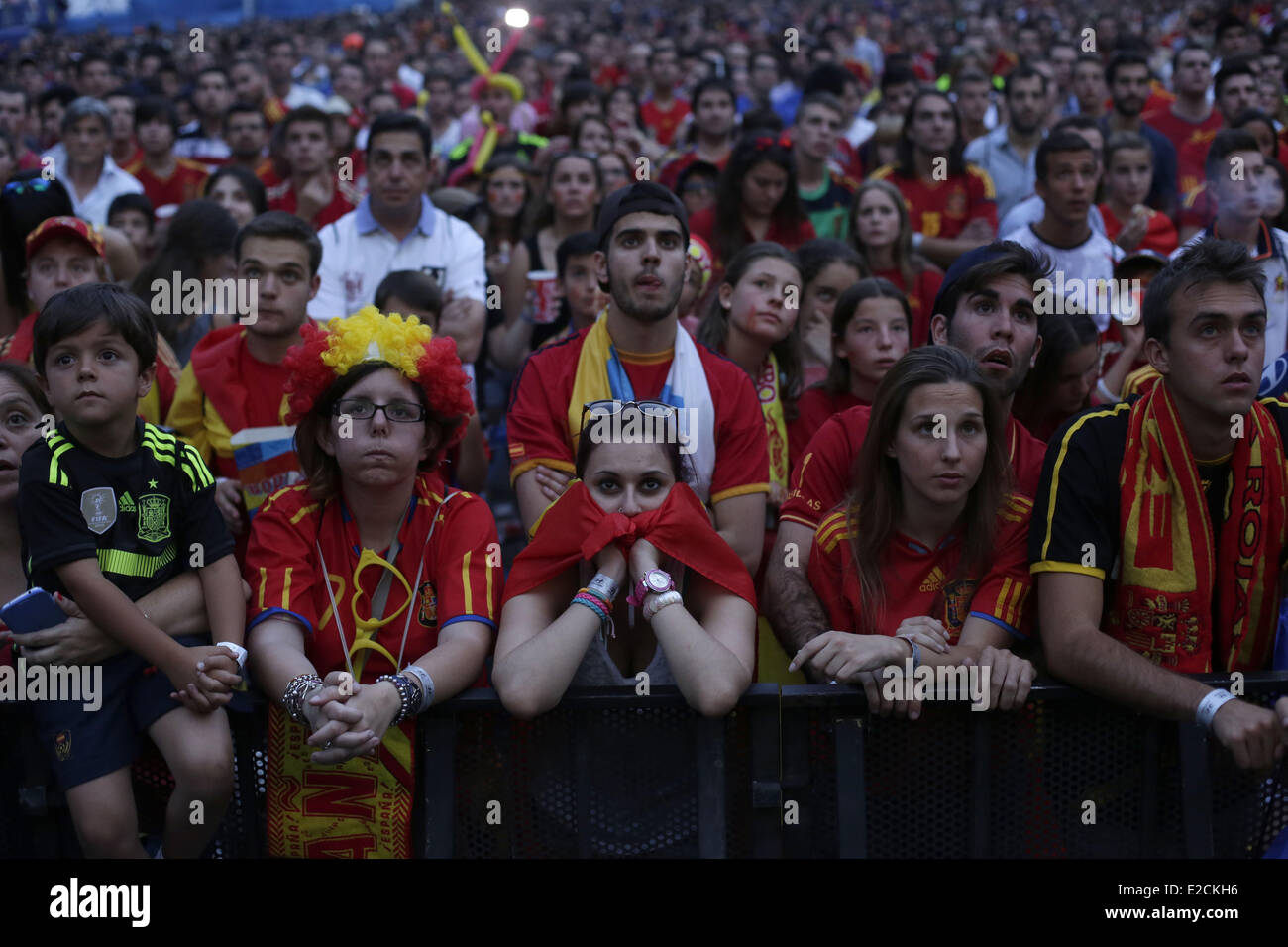 Madrid, Spain. 18th June, 2014. Spanish soccer fans gesture during a ...