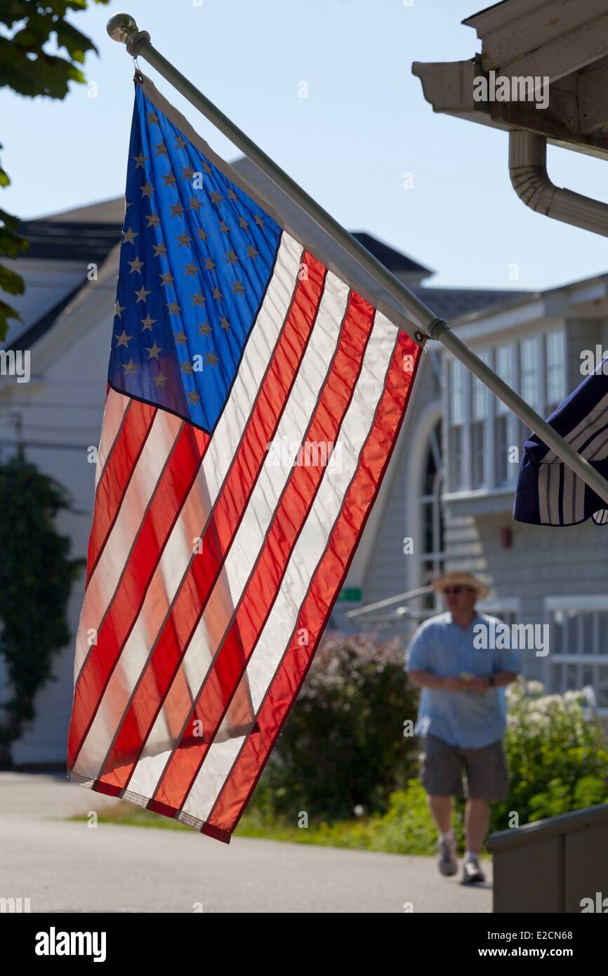 United States Maine Ogunquit Perkins Cove American flag and man walking ...
