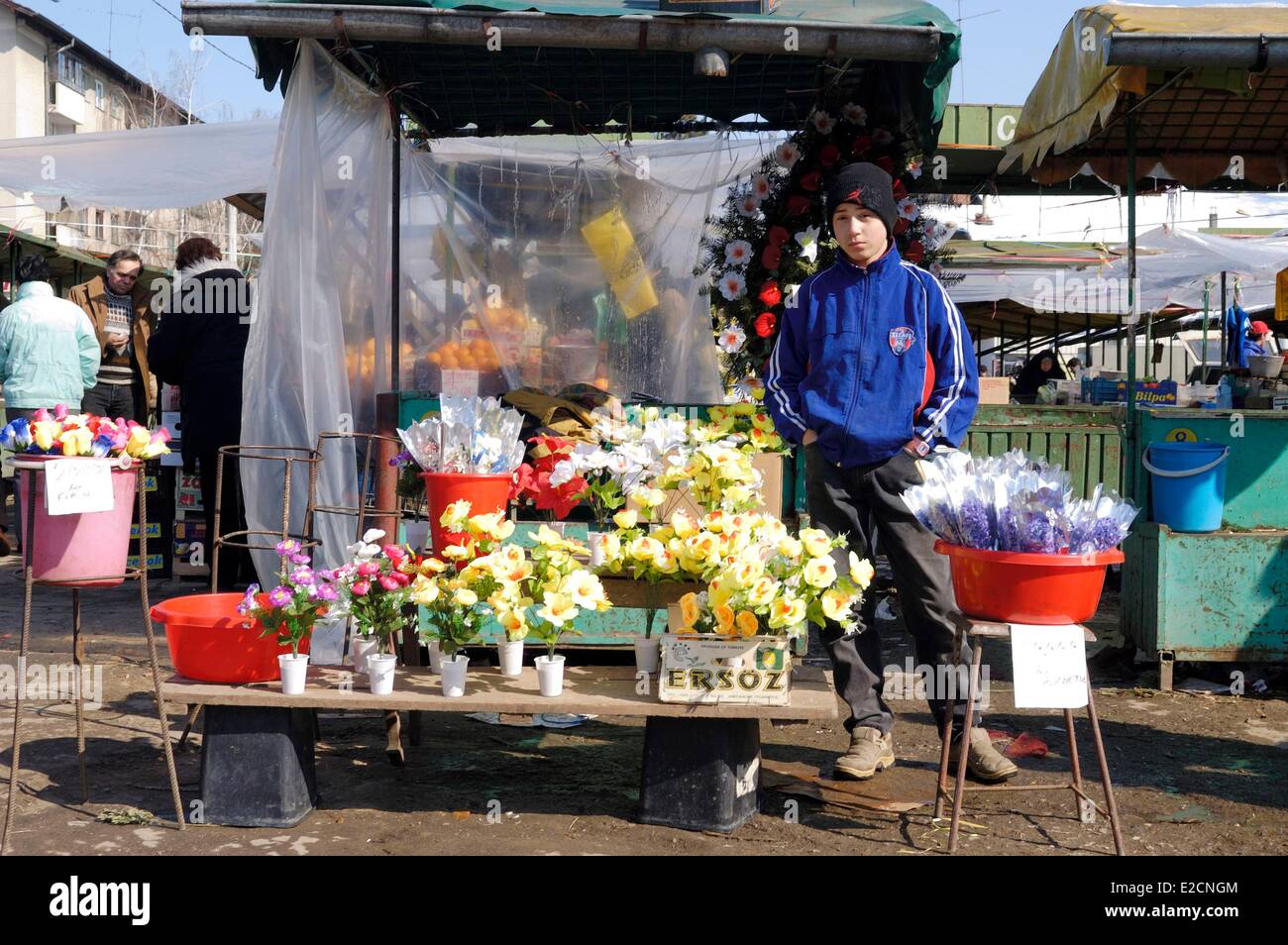 Boy selling flowers hi-res stock photography and images - Alamy