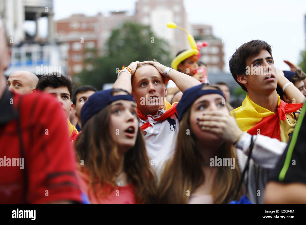 Madrid, Spain. 19th June, 2014. Spanish people reacts during the World ...