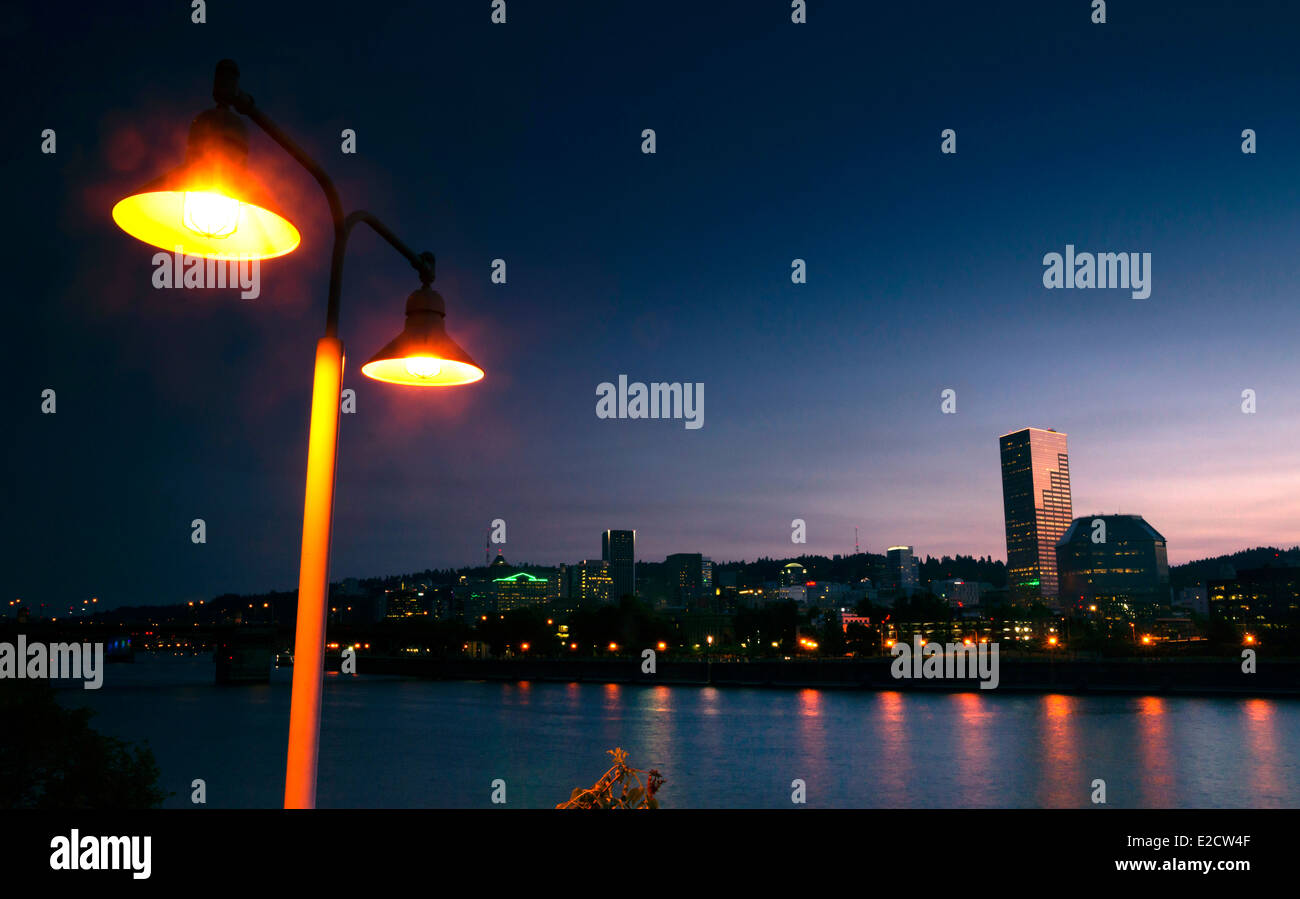 A dtreet lamp illuminates the scene on the waterfront in Portland Stock ...