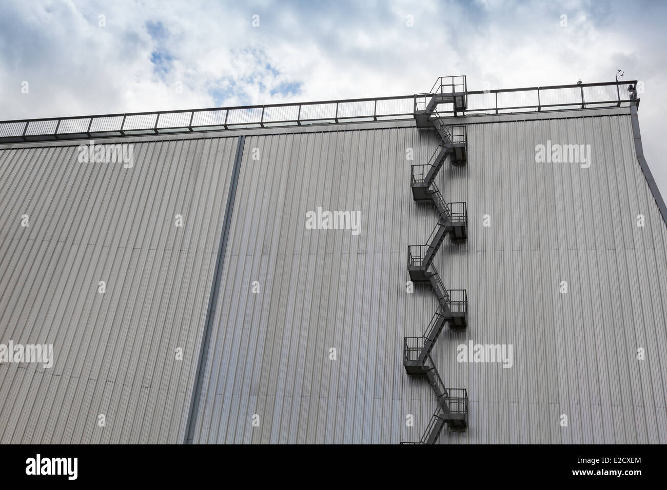 Fire escape ladder on modern industrial building Stock Photo - Alamy