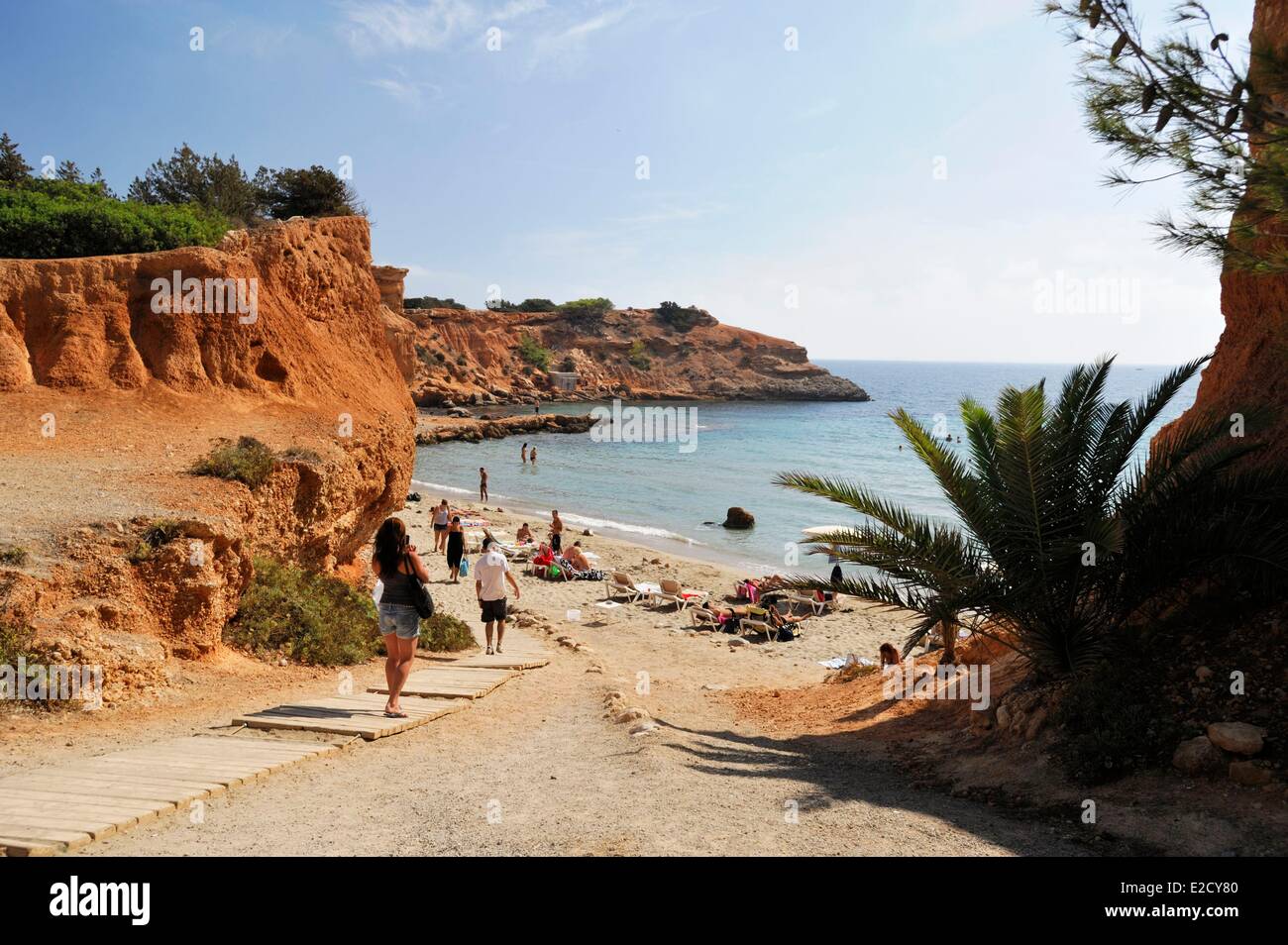 Spain Balearic islands Ibiza Sa Caleta beach and red cliffs listed as ...