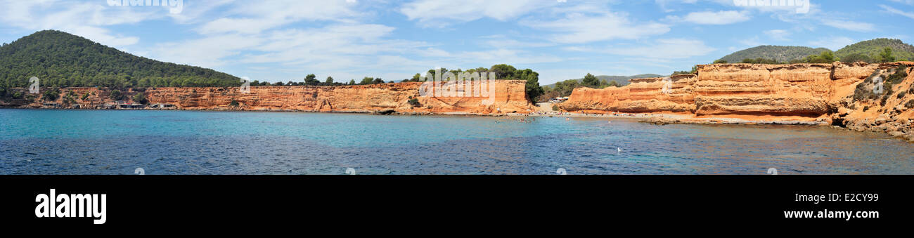 Spain Balearic islands Ibiza Sa Caleta beach and red cliffs listed as ...