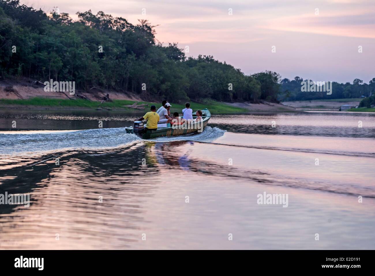 Brazil Amazonas state Amazon river basin along Rio Negro rowboat ...