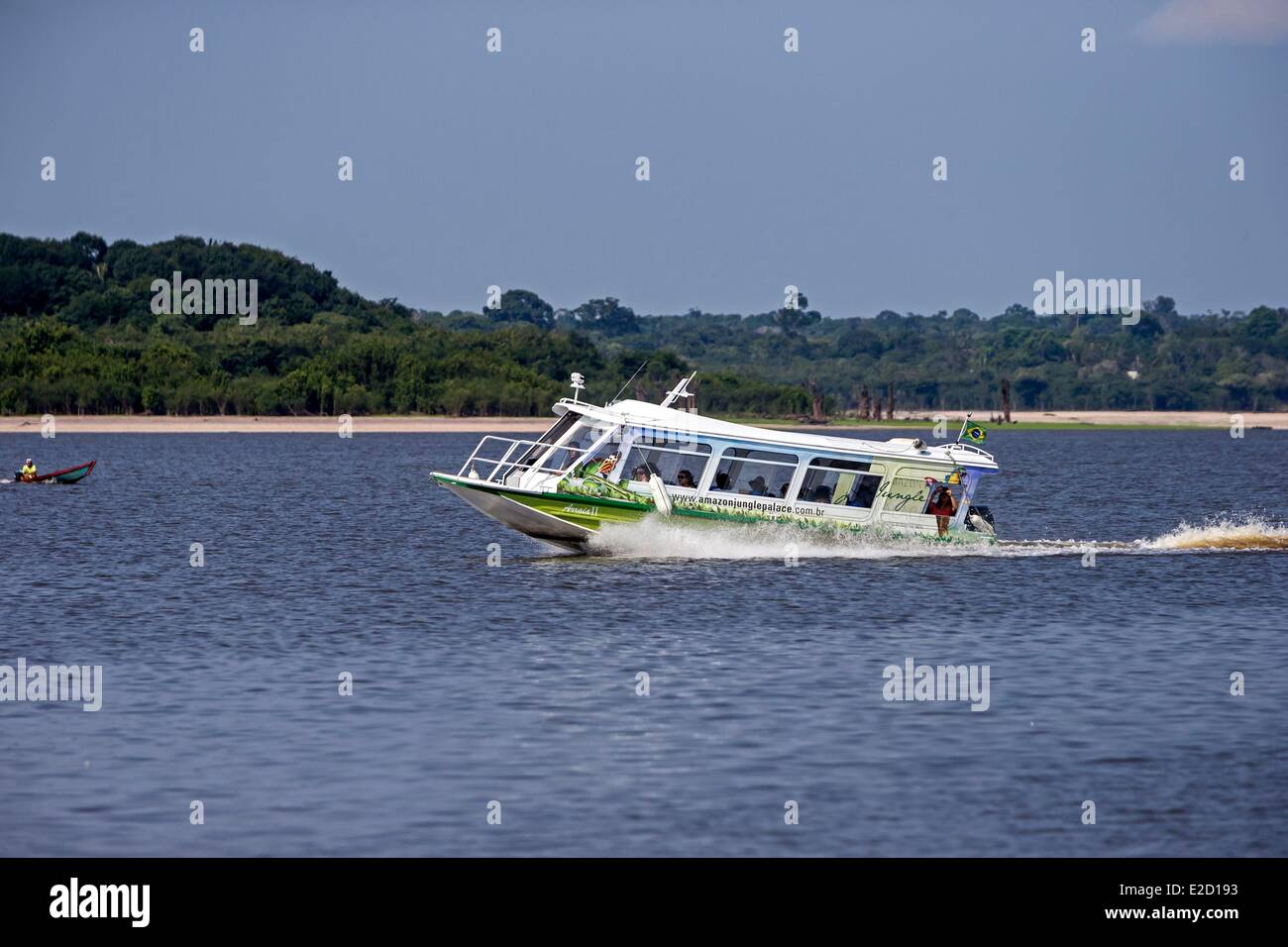 Brazil Amazonas state Amazon river basin along Rio Negro rowboat ...