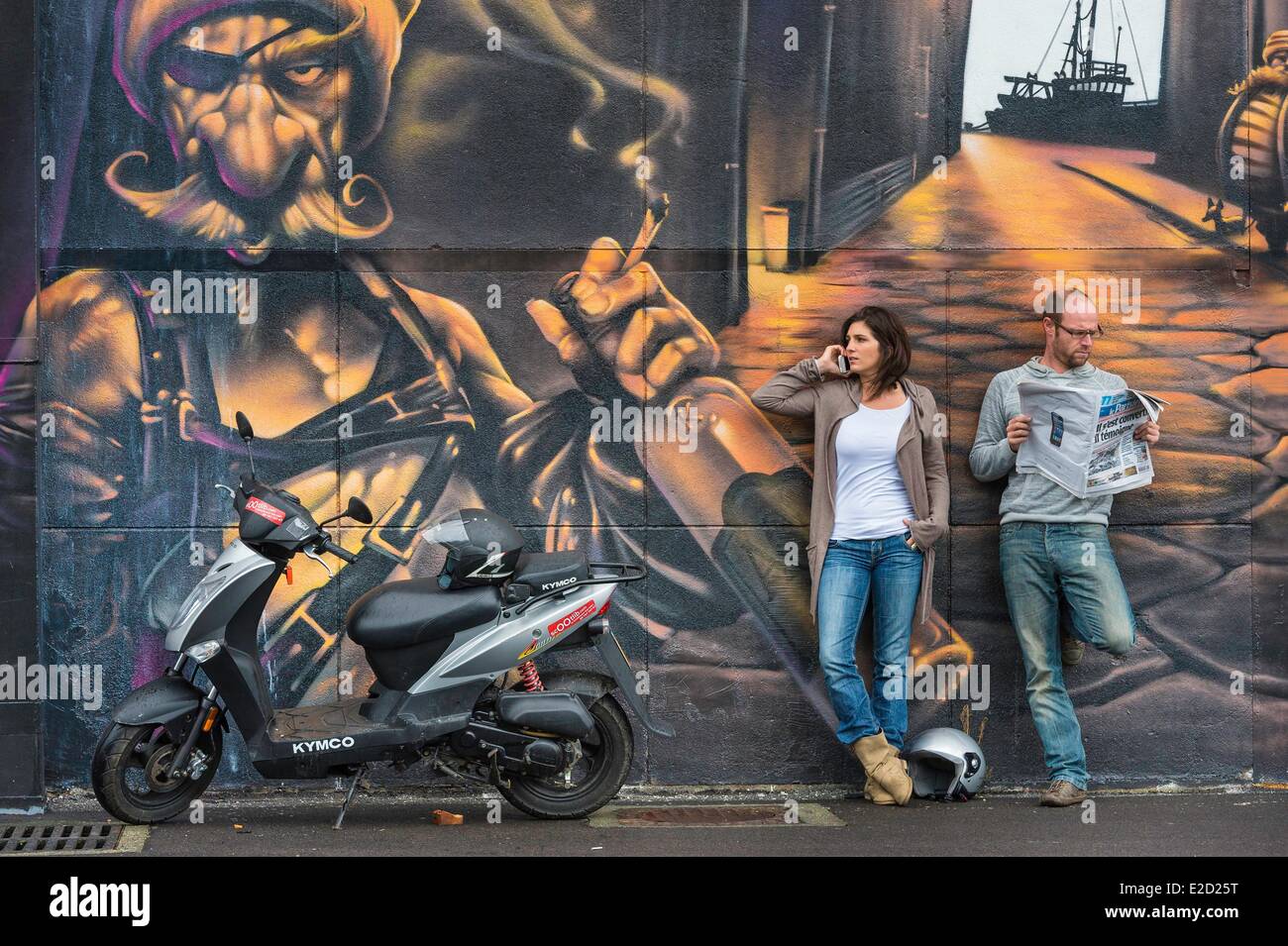 Graffiti man reading hi-res stock photography and images - Alamy