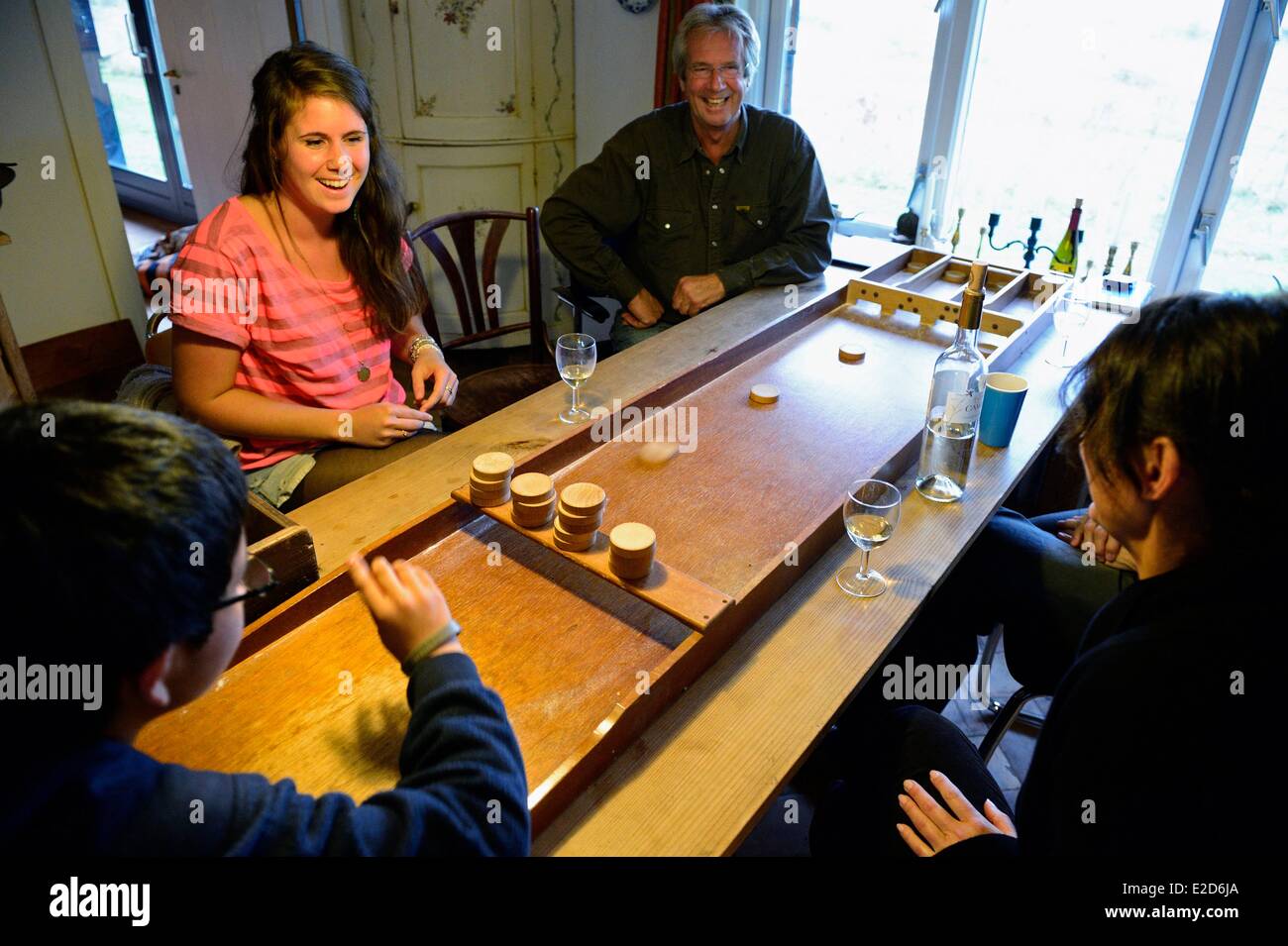 Netherlands Amsterdam family playing the game puck Stock Photo - Alamy