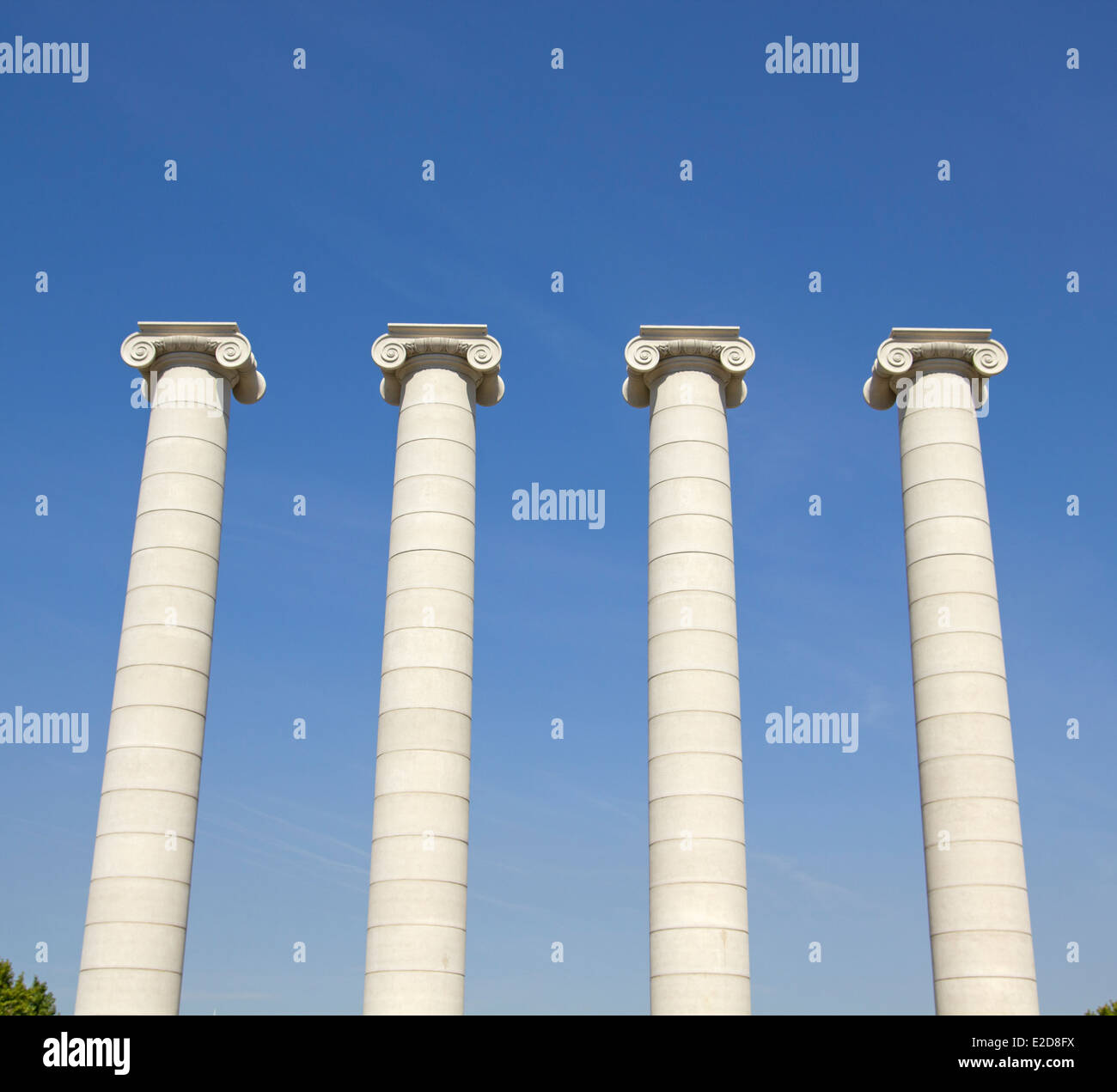 Four white columns near Royal palace. The columns, symbolizing the four ...