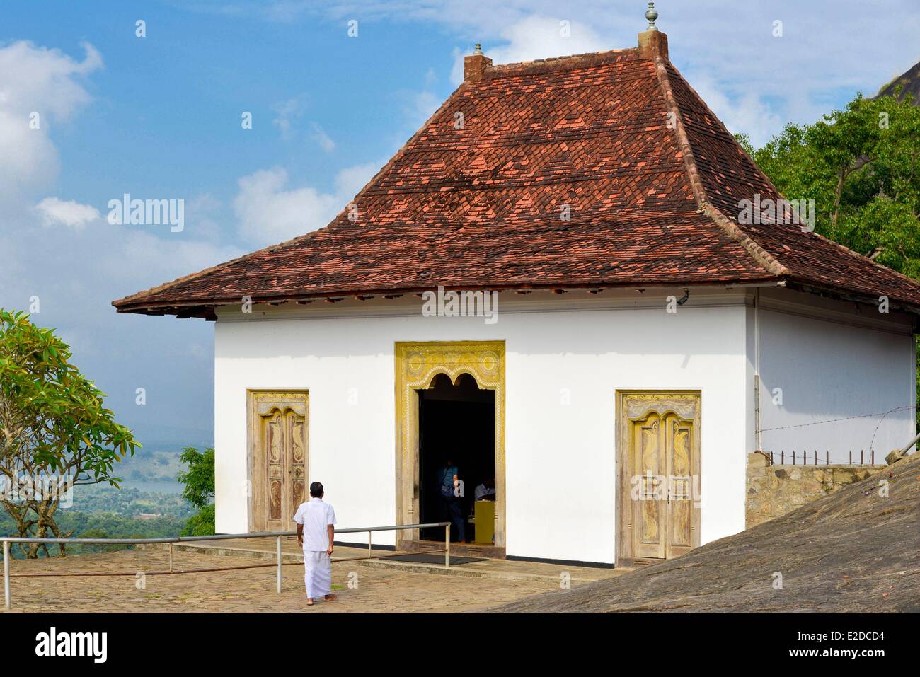 Sri Lanka, Central Province, Matale District, Dambulla, man walking ...