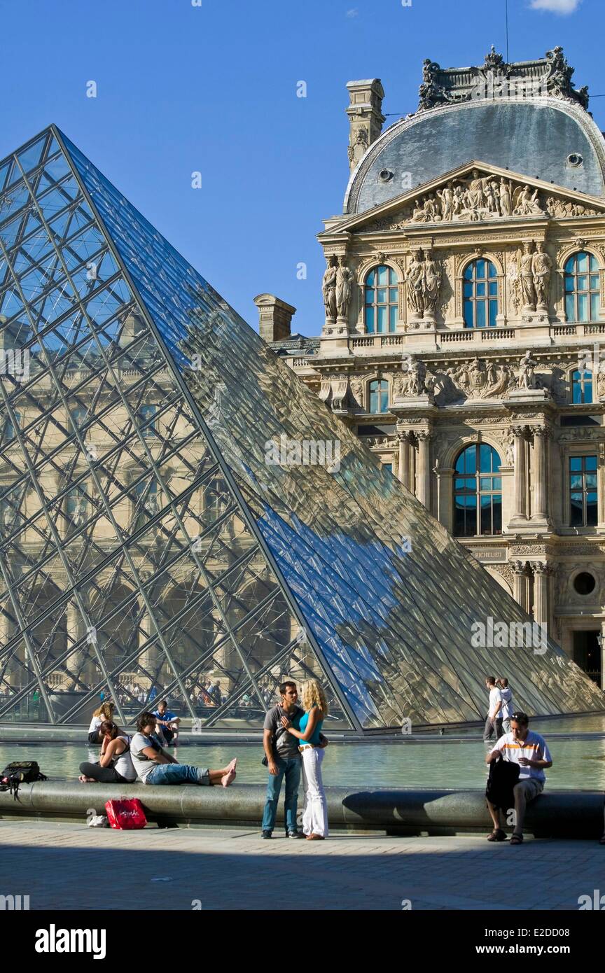 France Paris the Louvre Pyramid by the architect IM Pei and facade of ...