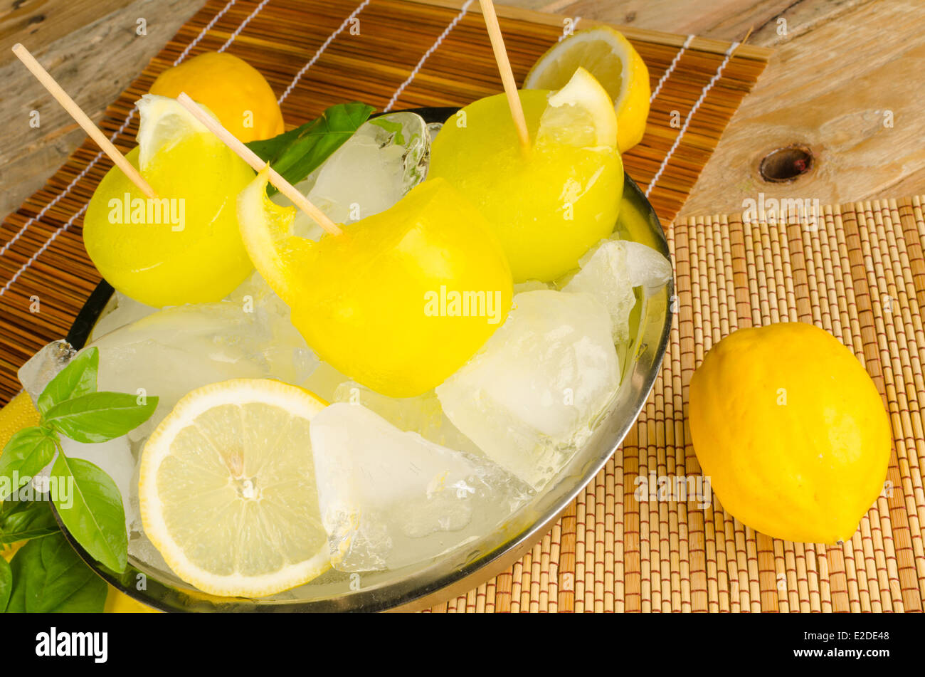 A bowl with homemade lemon ice pops Stock Photo - Alamy