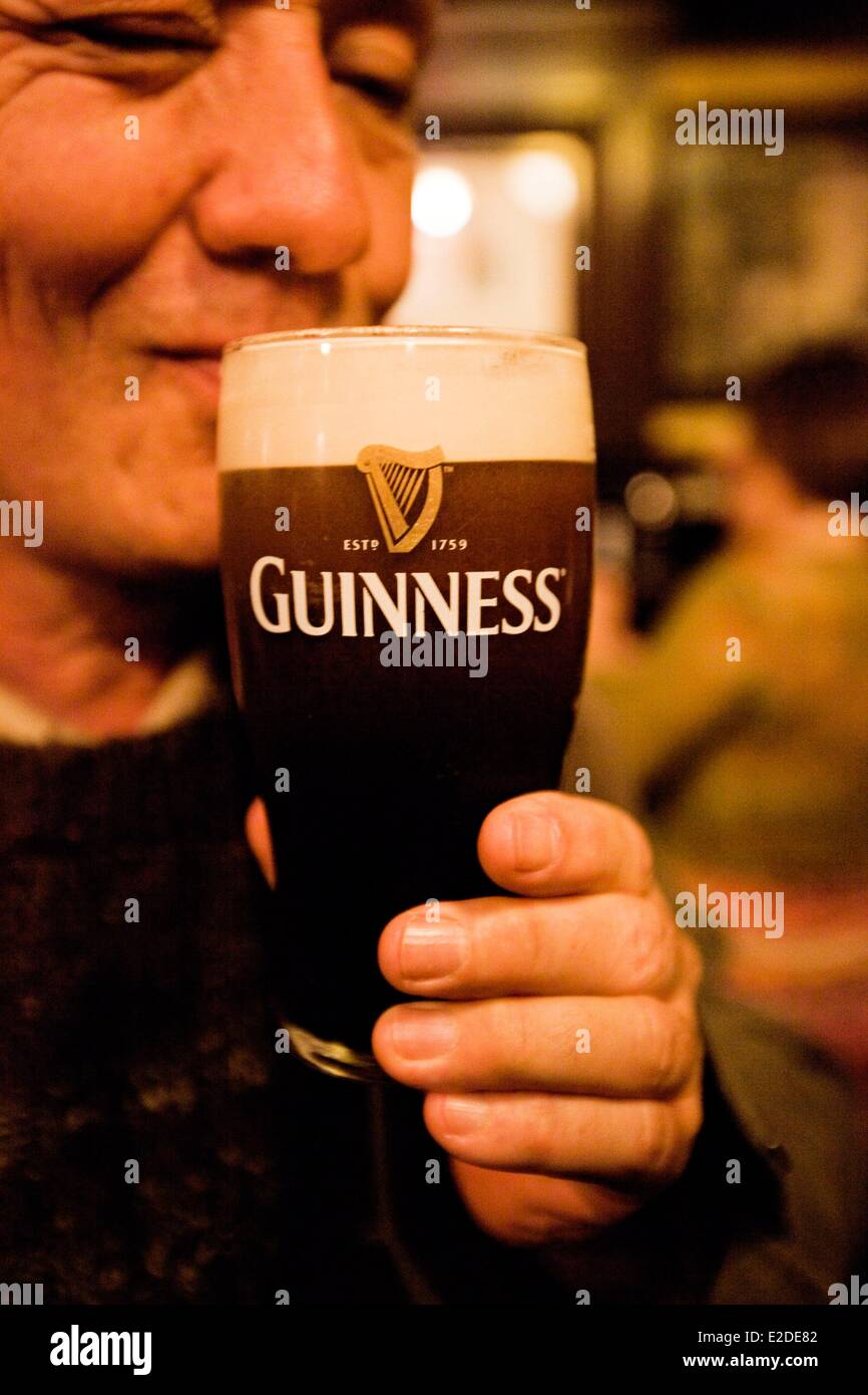 Man drinking guinness hi-res stock photography and images - Alamy