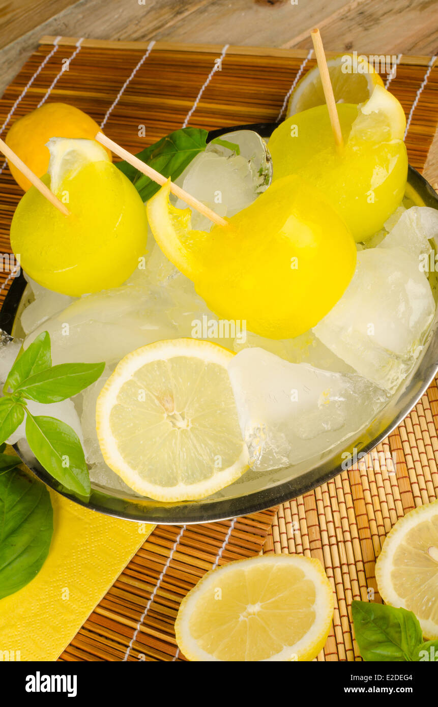 A bowl with homemade lemon ice pops Stock Photo - Alamy