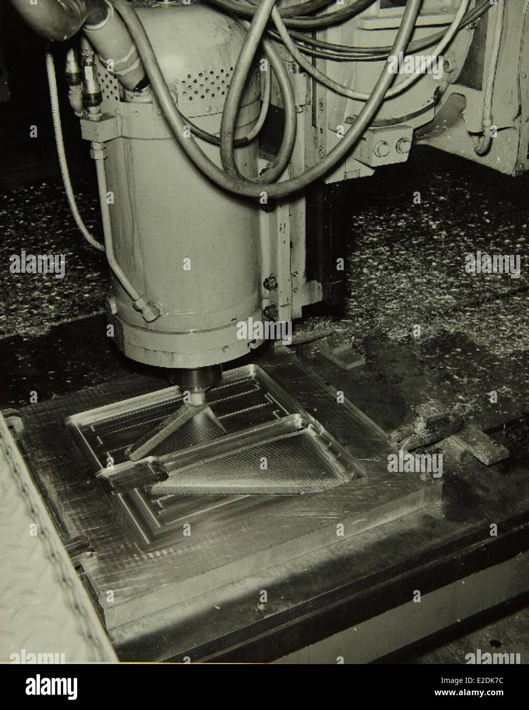 This image depicts workers at the Convair/General Dynamics plant ...