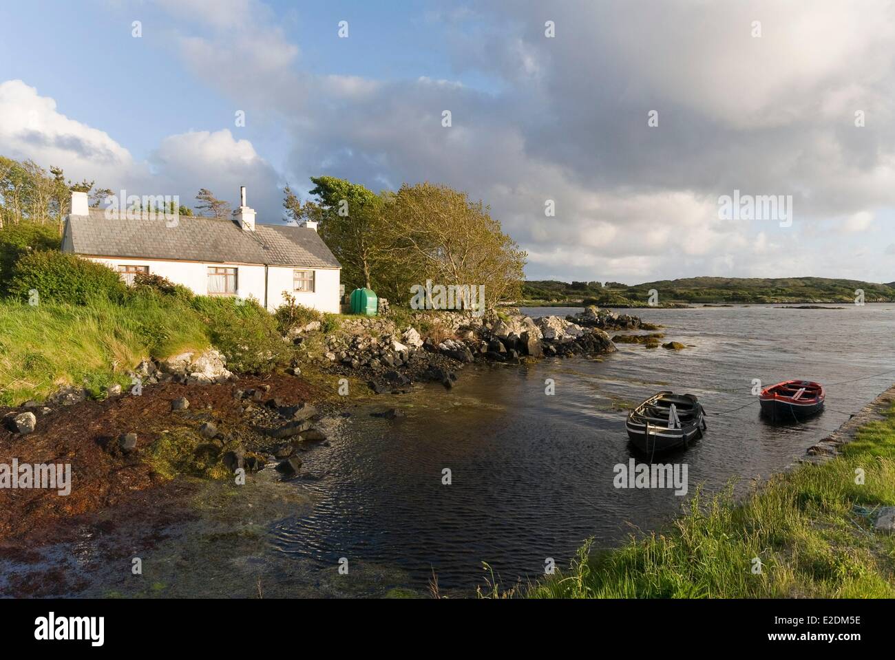 Ireland Galway County Connemara boats and home Stock Photo - Alamy