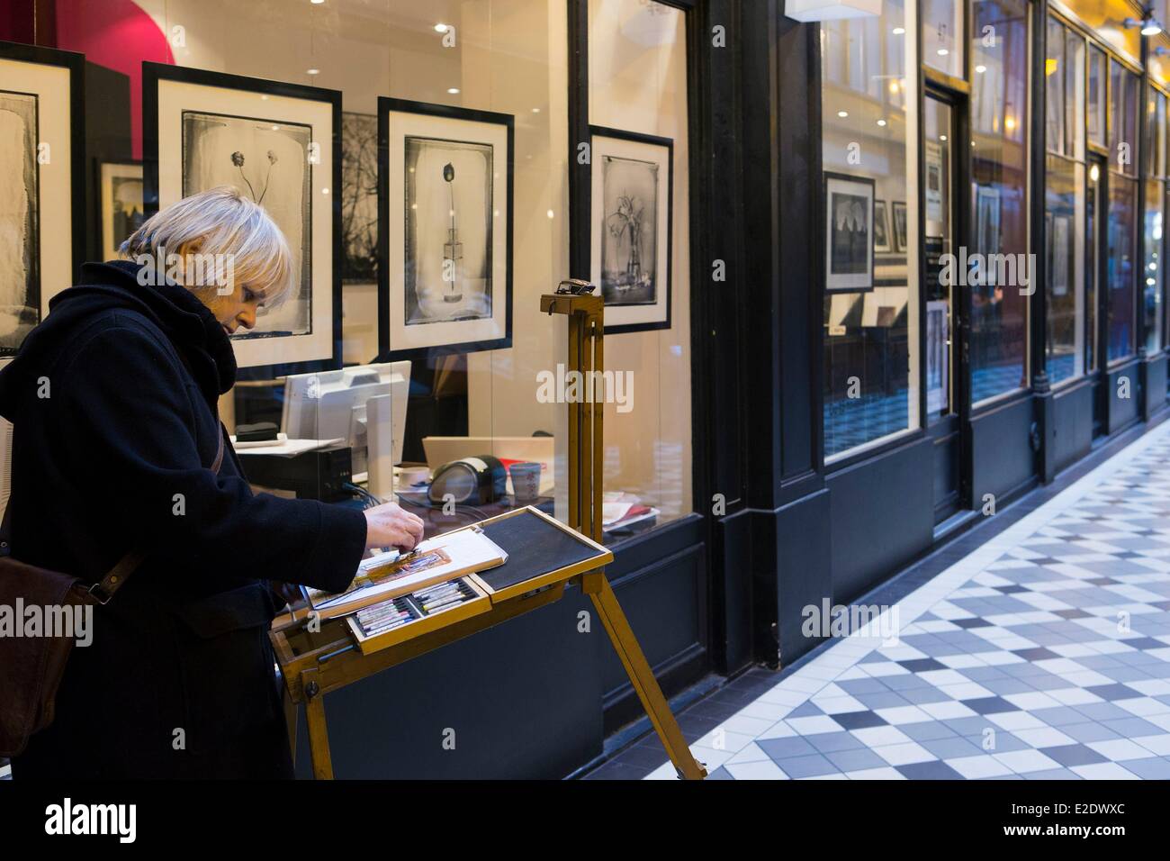 France Paris Passage Jouffroy painter in front of Verdeau Photo Gallery ...