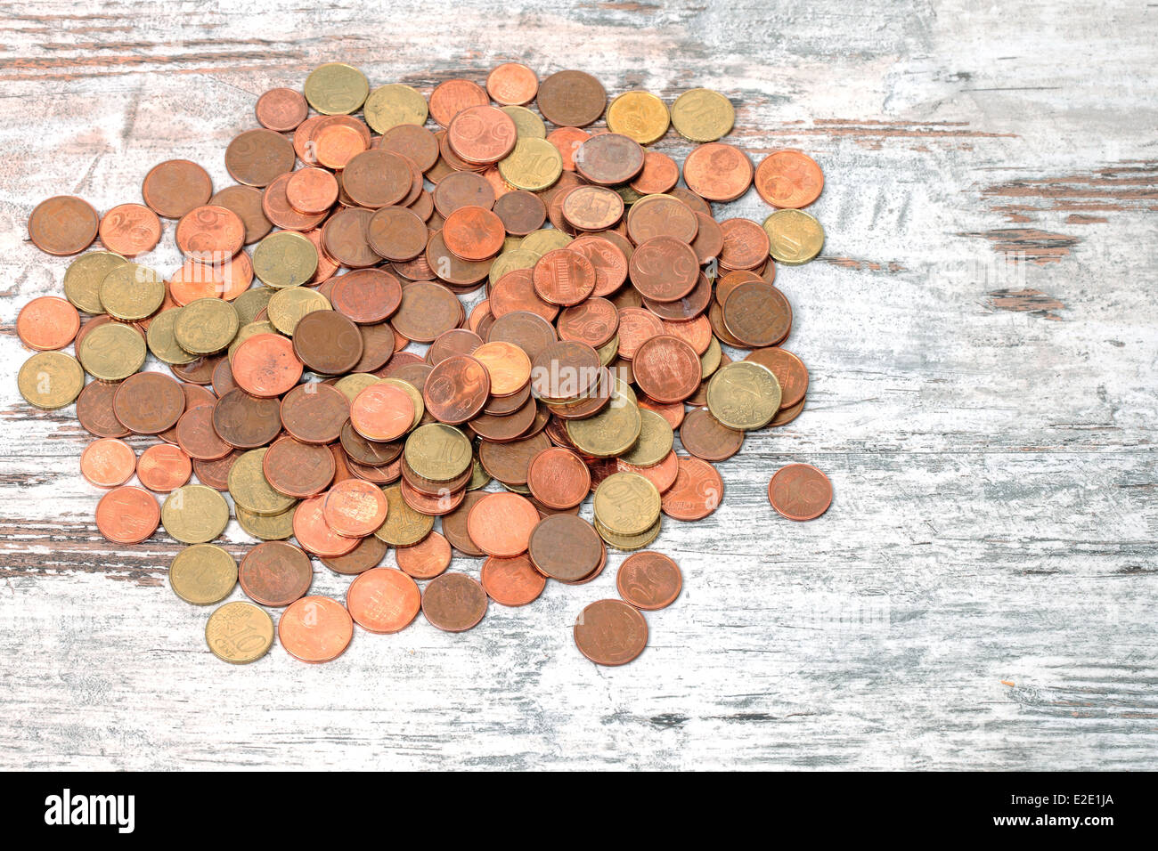 pile of coins on a dirty surface Stock Photo - Alamy