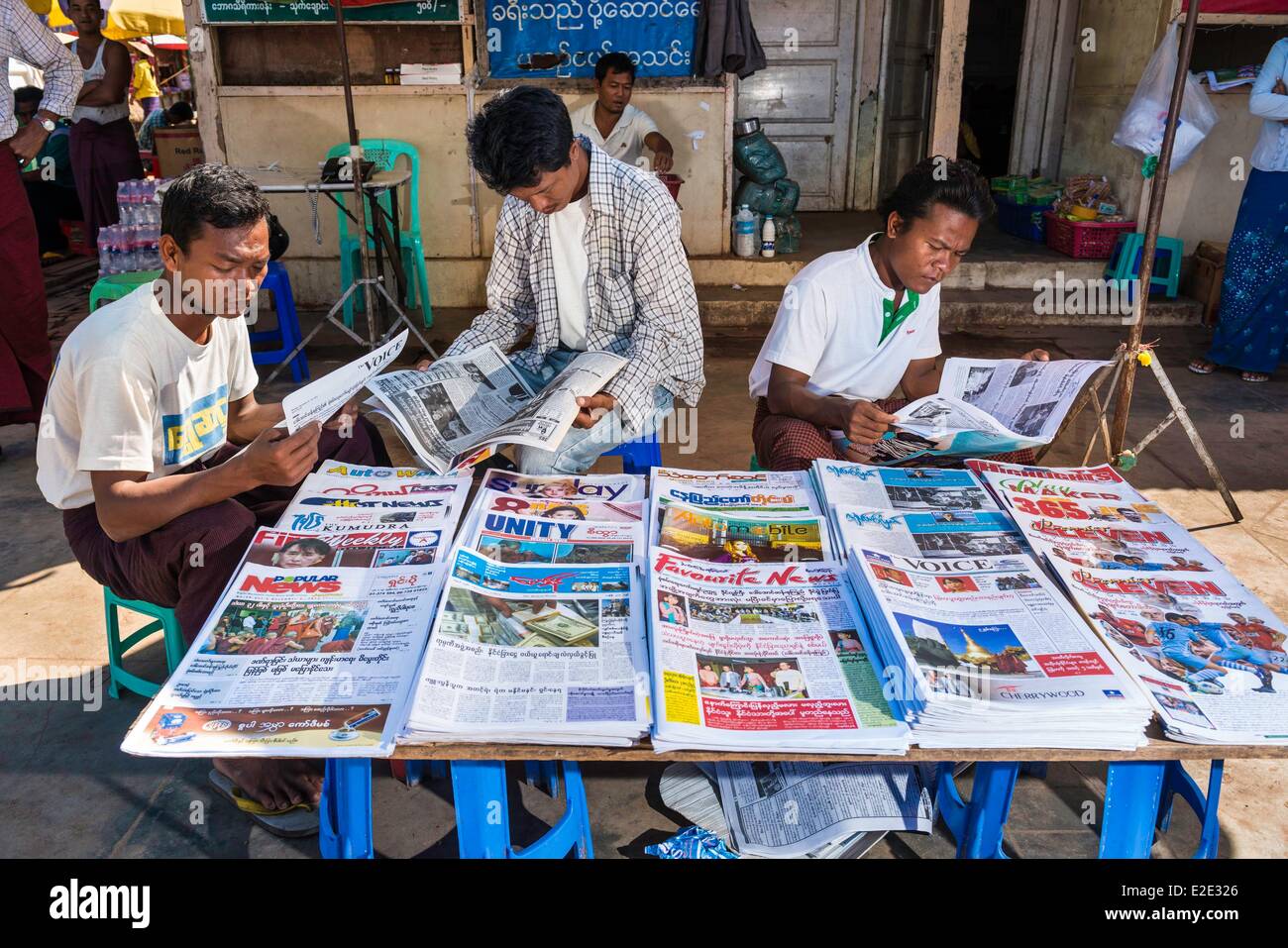 Newspaper man reading myanmar hi-res stock photography and images - Alamy