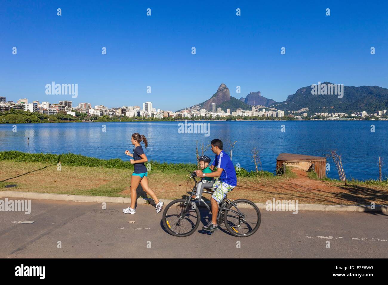 Brazil, Rio de Janeiro, Lagoa neighborhood, jogging on Lake Rodrigo de ...
