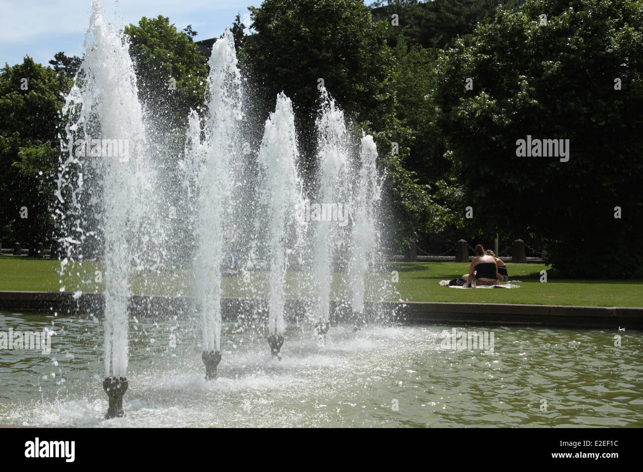 People enjoying the sunshine in Cardiff city centre, during the hot ...