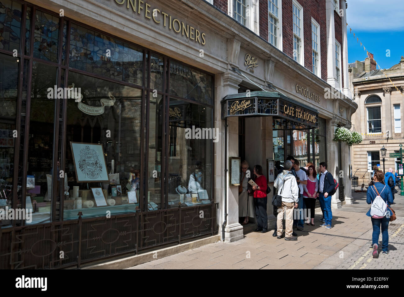 People queuing in line outside Bettys Cafe and Tea Rooms Davygate York ...
