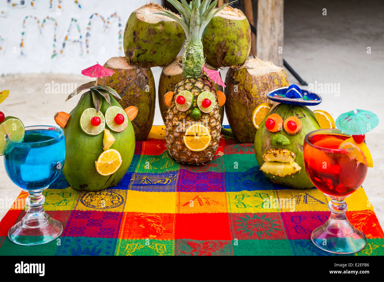 Pineapple and coconut display at an outdoor bar in the village of ...