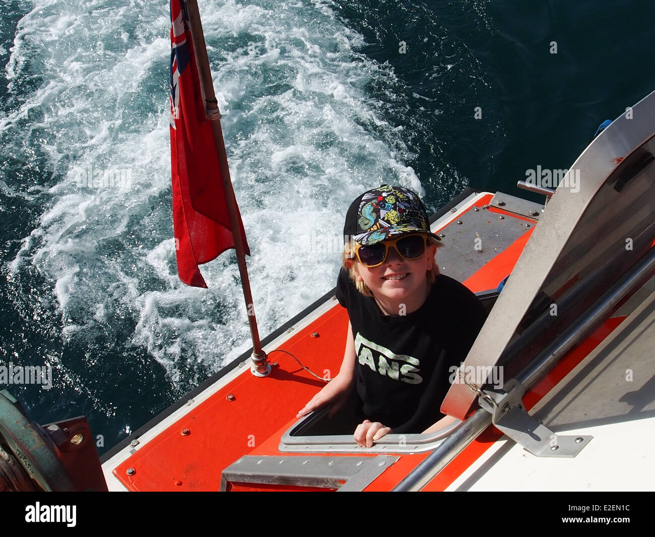 young boy in boat Stock Photo - Alamy