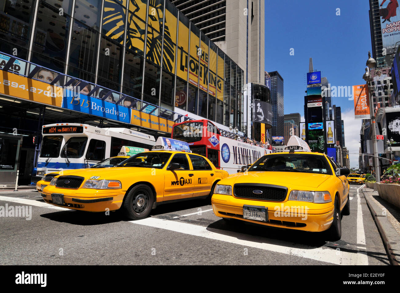 United States, New York, Times Square, yellow cab and buses in traffic ...