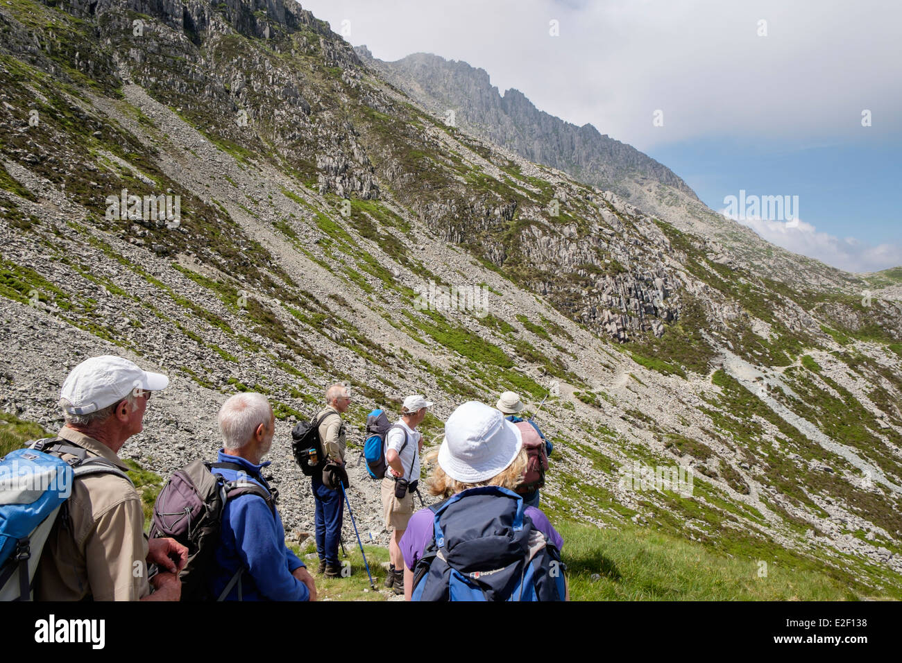 Hikers hiking on path to Bwlch Tryfan looking at Bristly Ridge in ...