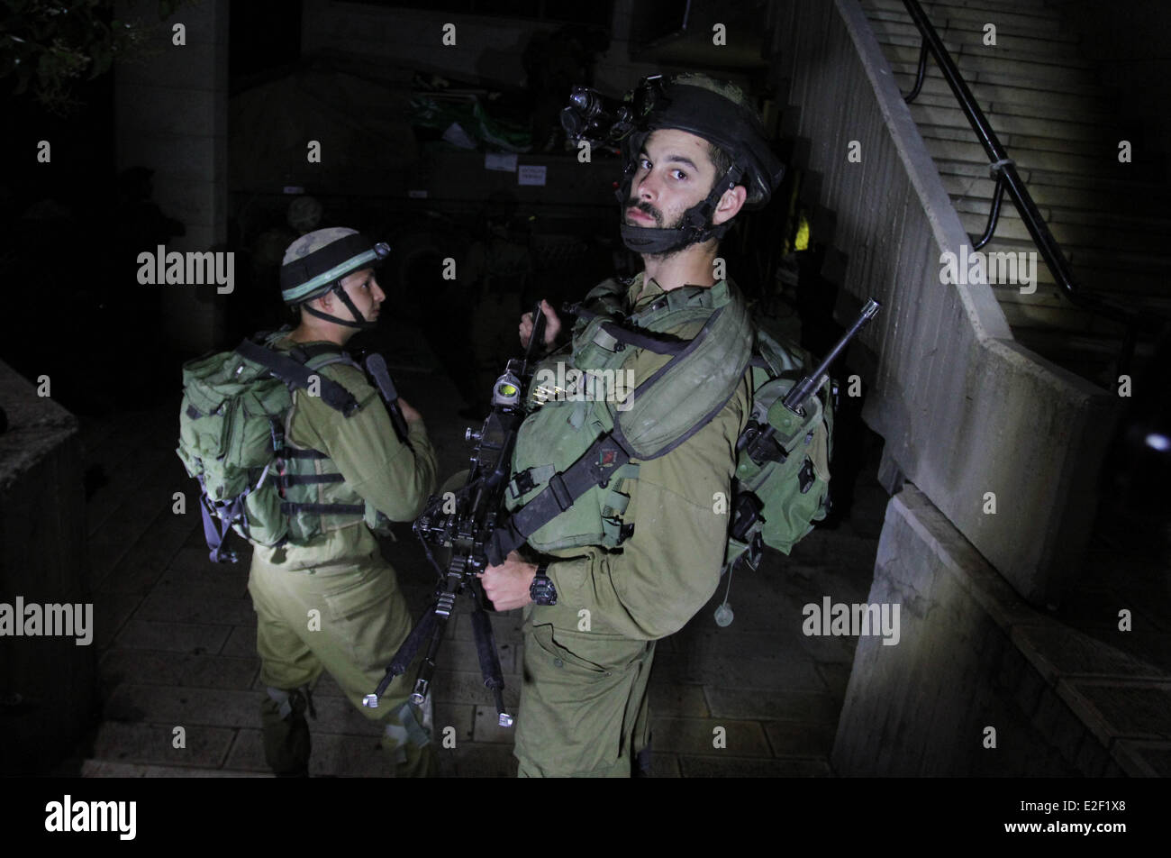 Ramallah, West Bank. 19th June, 2014. Israeli soldiers patrol at ...