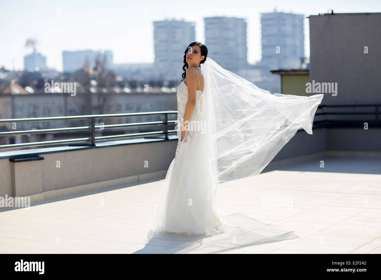 Beautiful bride standing wall hi-res stock photography and images - Alamy