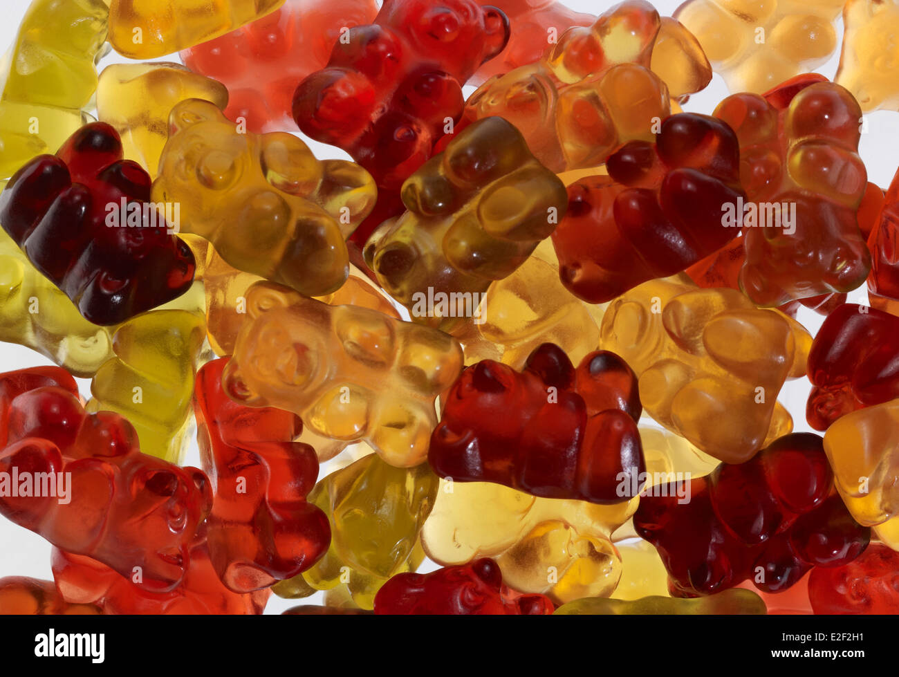 colorful gummy bears in light back Stock Photo - Alamy
