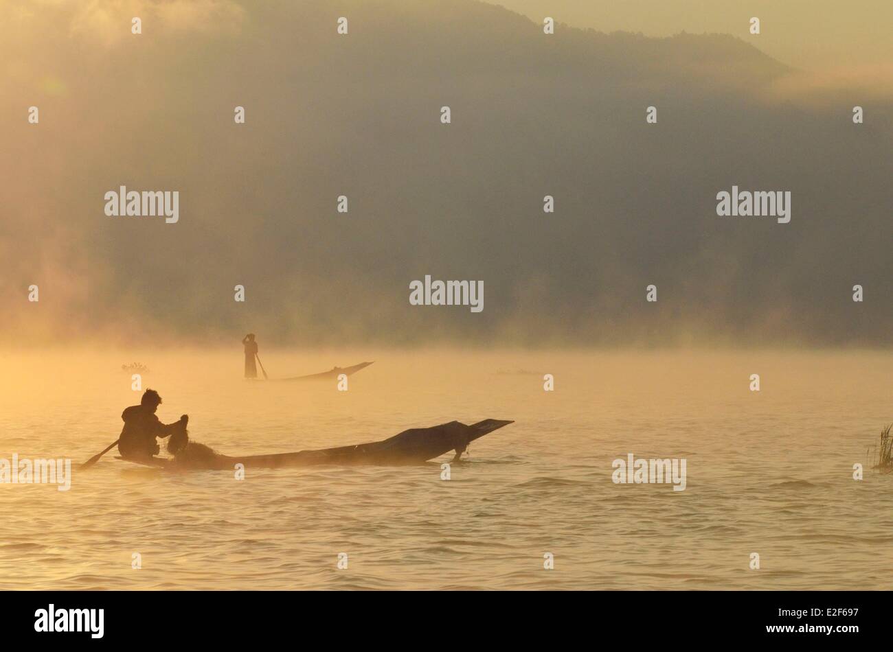 Myanmar silhouette sunrise fisherman hi-res stock photography and ...