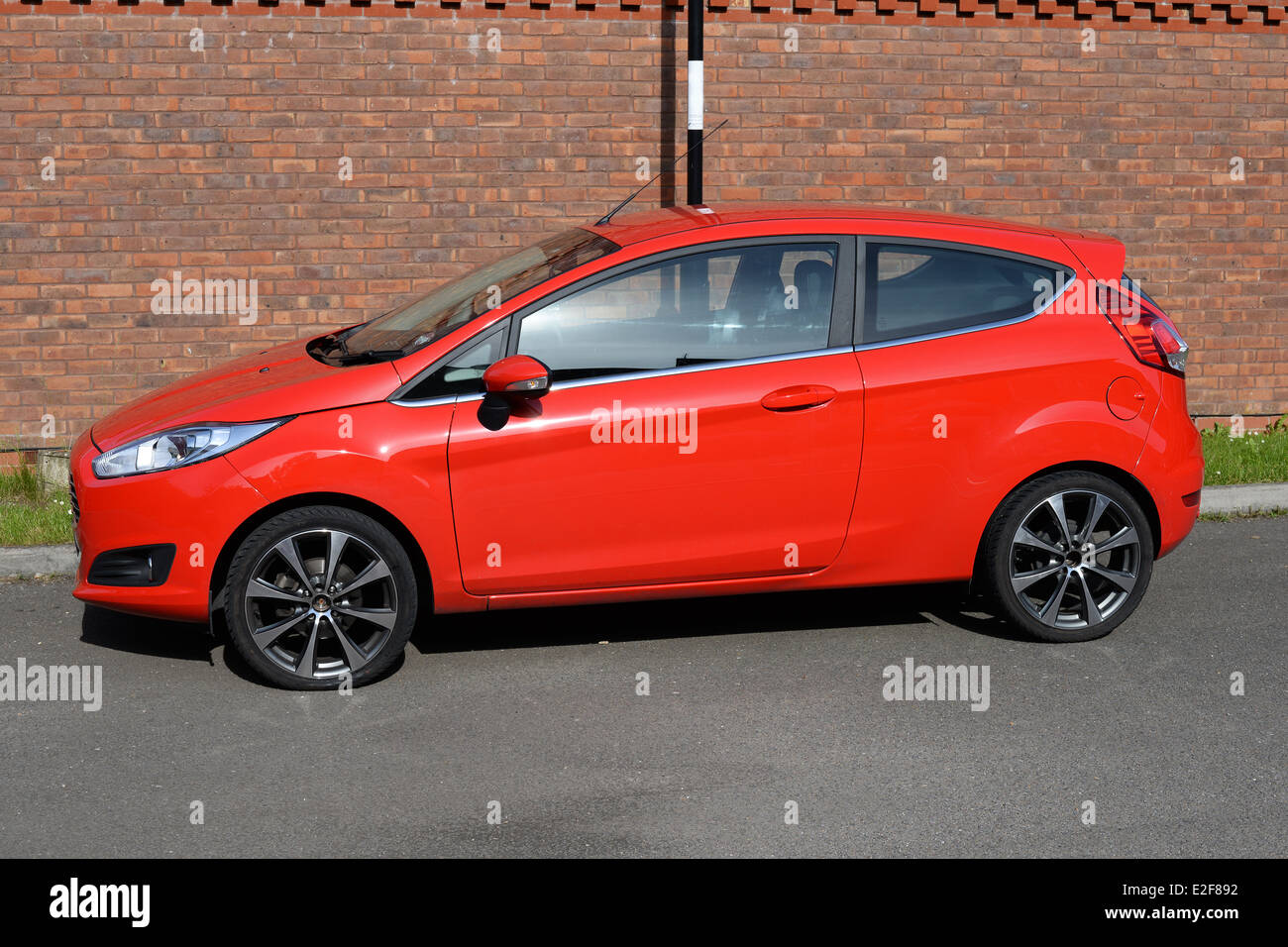 New red hatchback car Stock Photo - Alamy