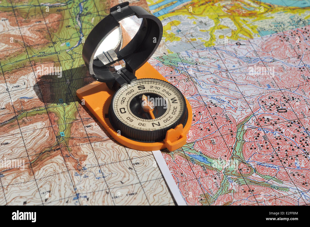 Maps and compass. Compass on the map - this is the open door to the ...
