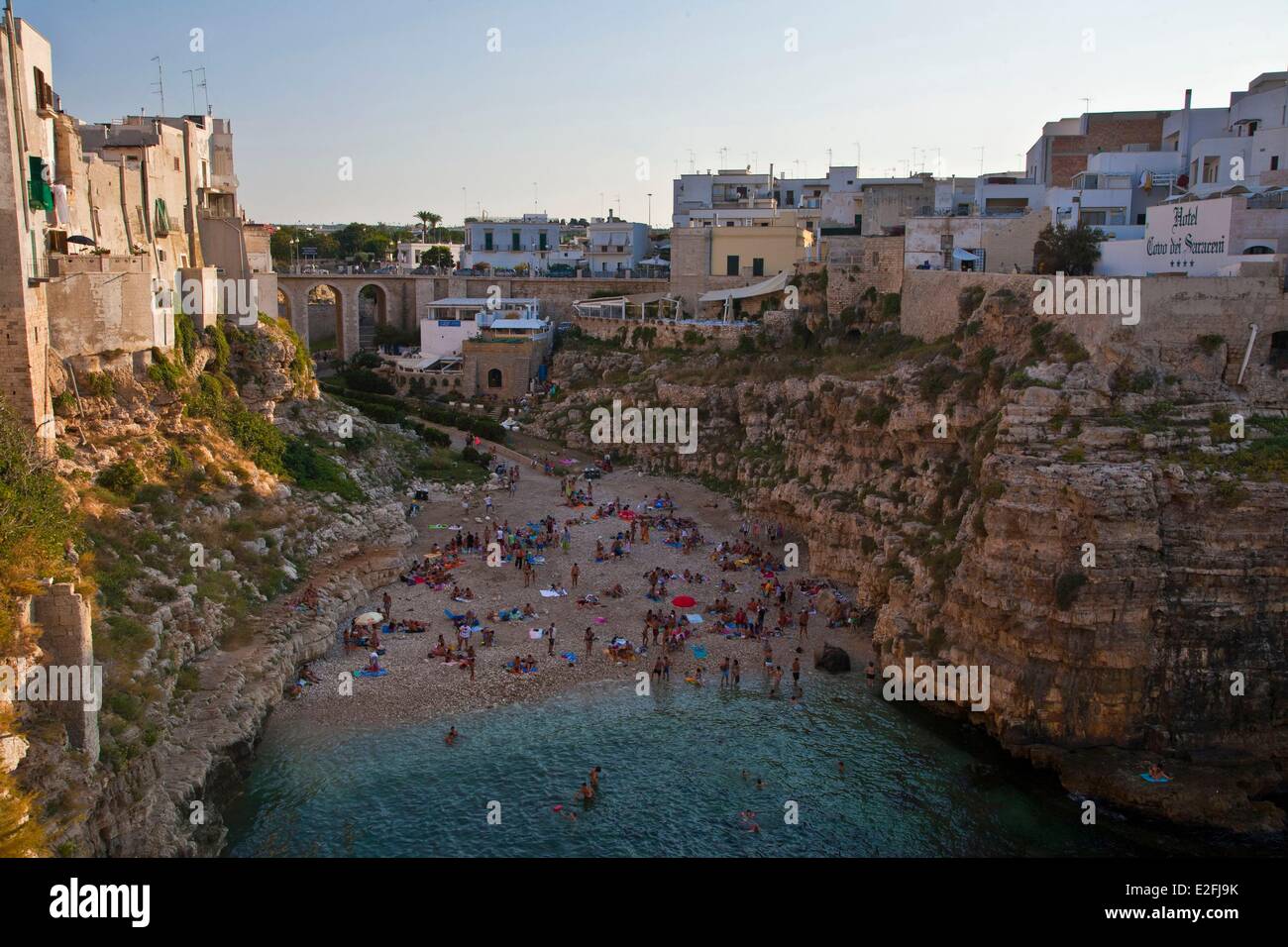 Italy, Puglia, Polignano a Mare, beach on the Adriatic Sea Stock Photo ...