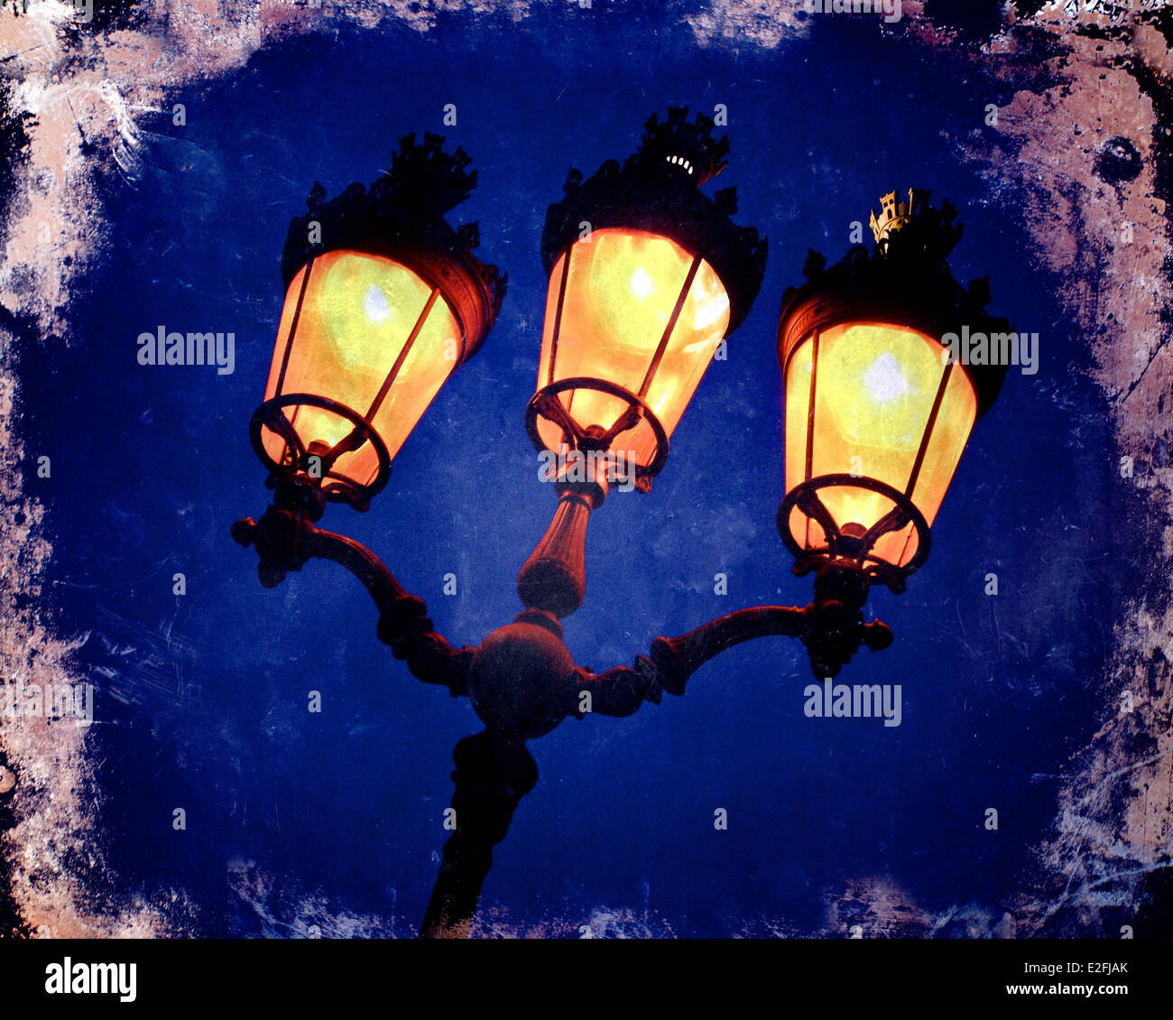Street lamp illuminated - art effect image Stock Photo - Alamy