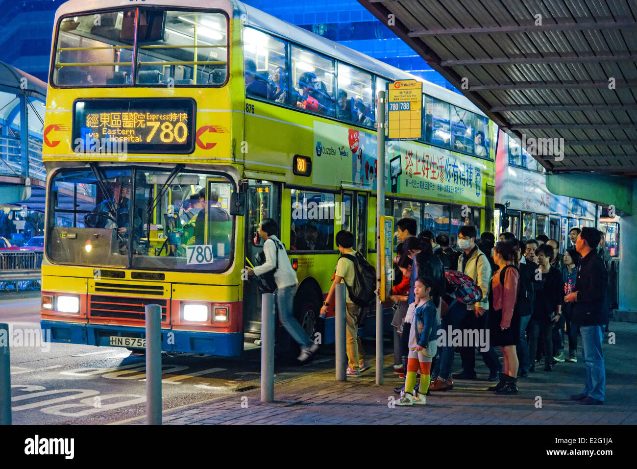 China Hong Kong Kowloon District Bus station passengers boarding in a night bus stop Stock Photo ...