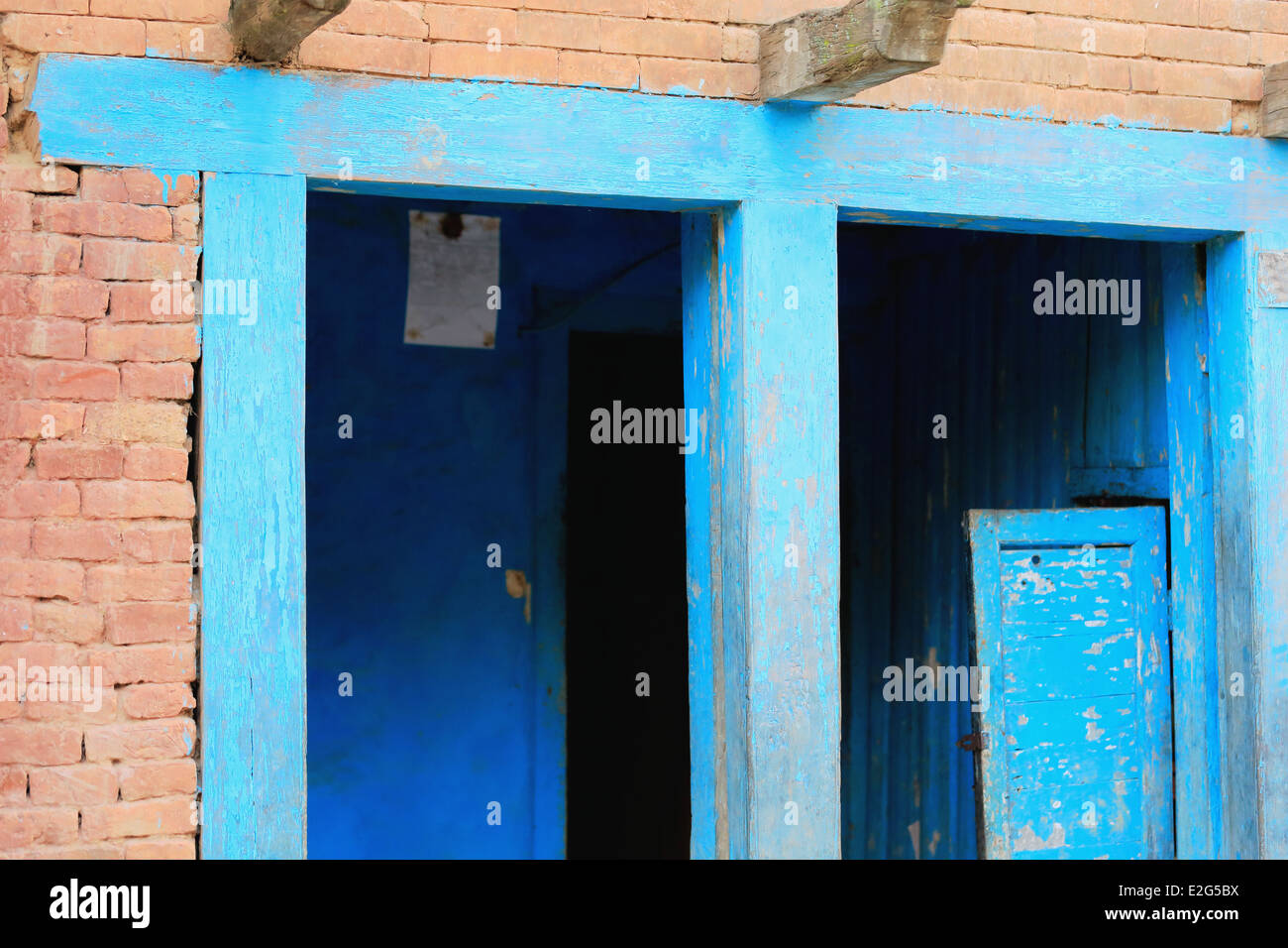 Blue painted wooden door of a newari style house. Bandipur-Tanahu ...