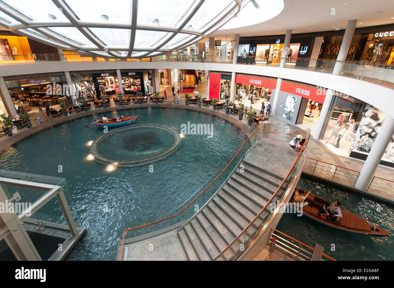Singapore Mall The Shop an artificial river runs through the center and ...