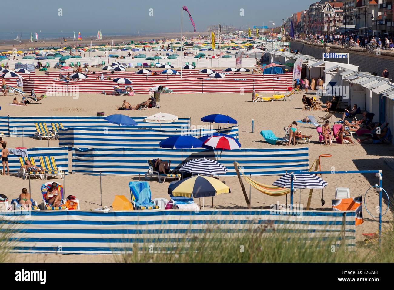 Belgium West Flanders De Haan beach huts sun loungers and parasols for ...