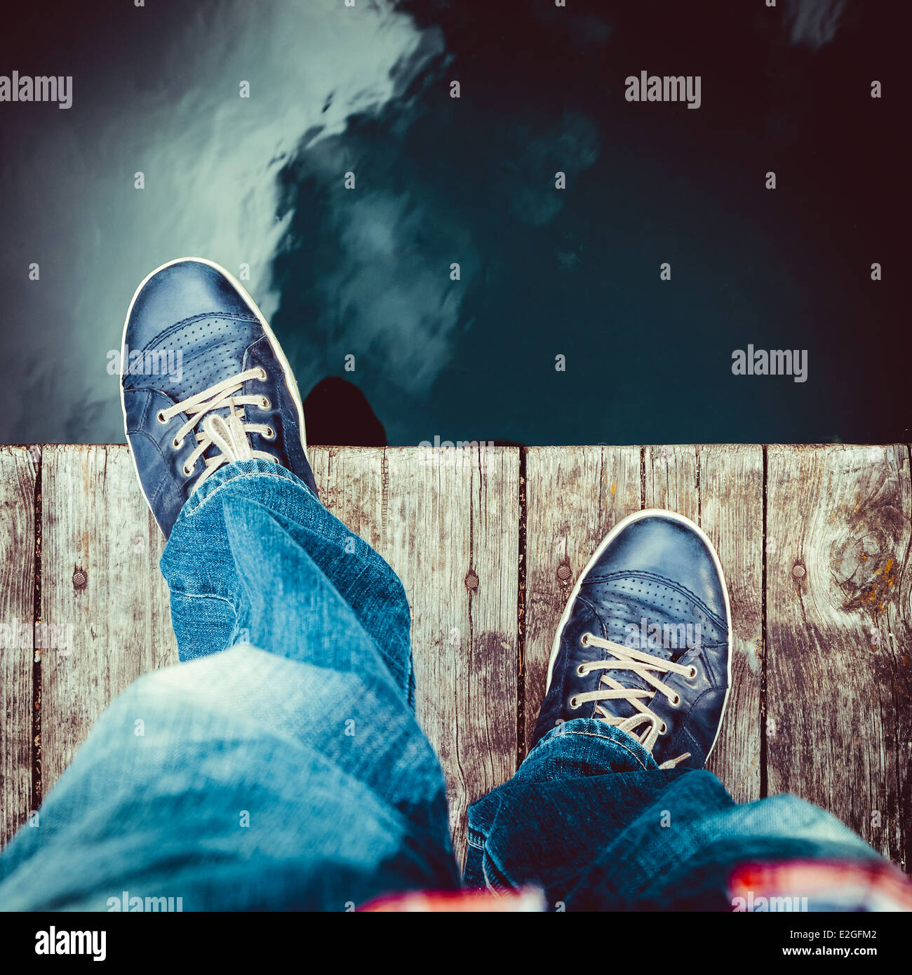 Shoe above man conceptual hi-res stock photography and images - Alamy