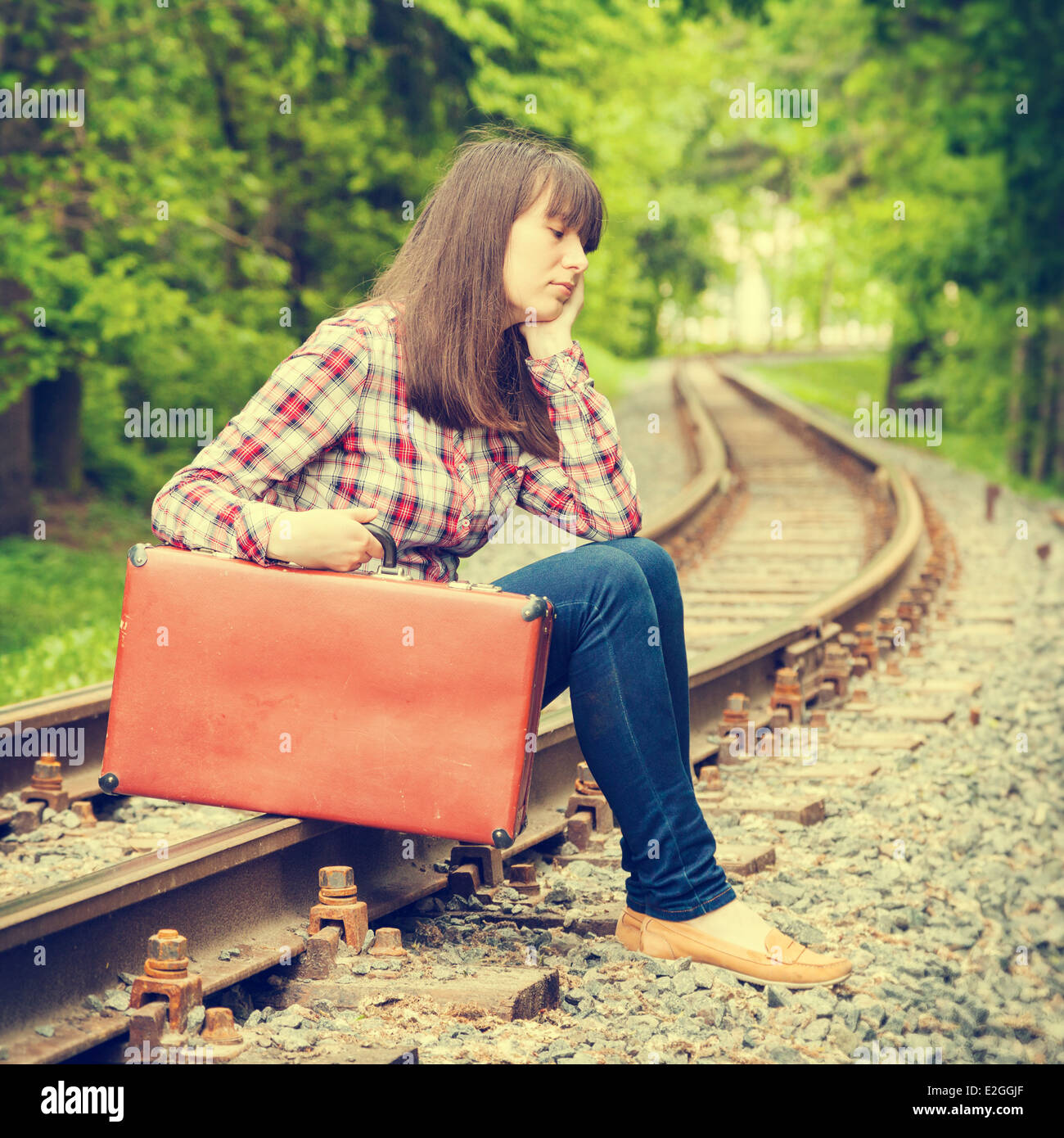 Sad Girl With Suitcase